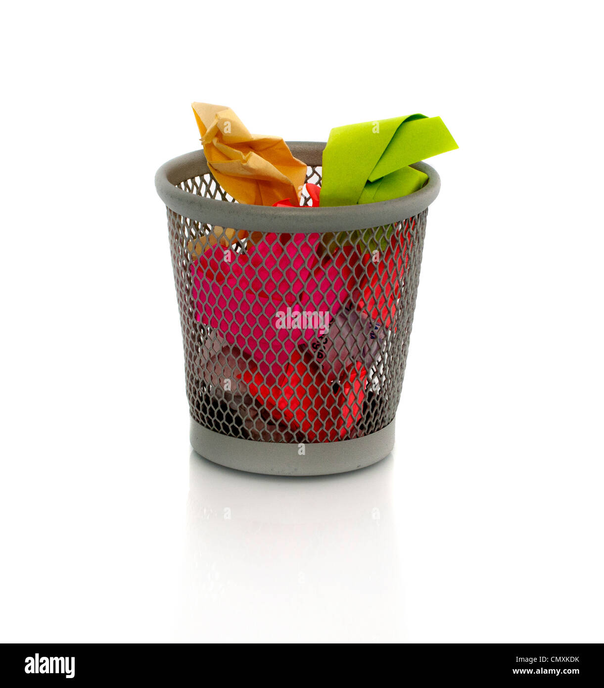 colored paper in waste basket as trash Stock Photo - Alamy