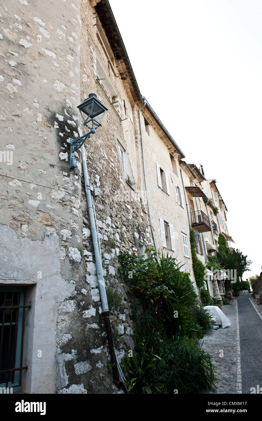 An alley outside of an old French riviera building Stock Photo - Alamy