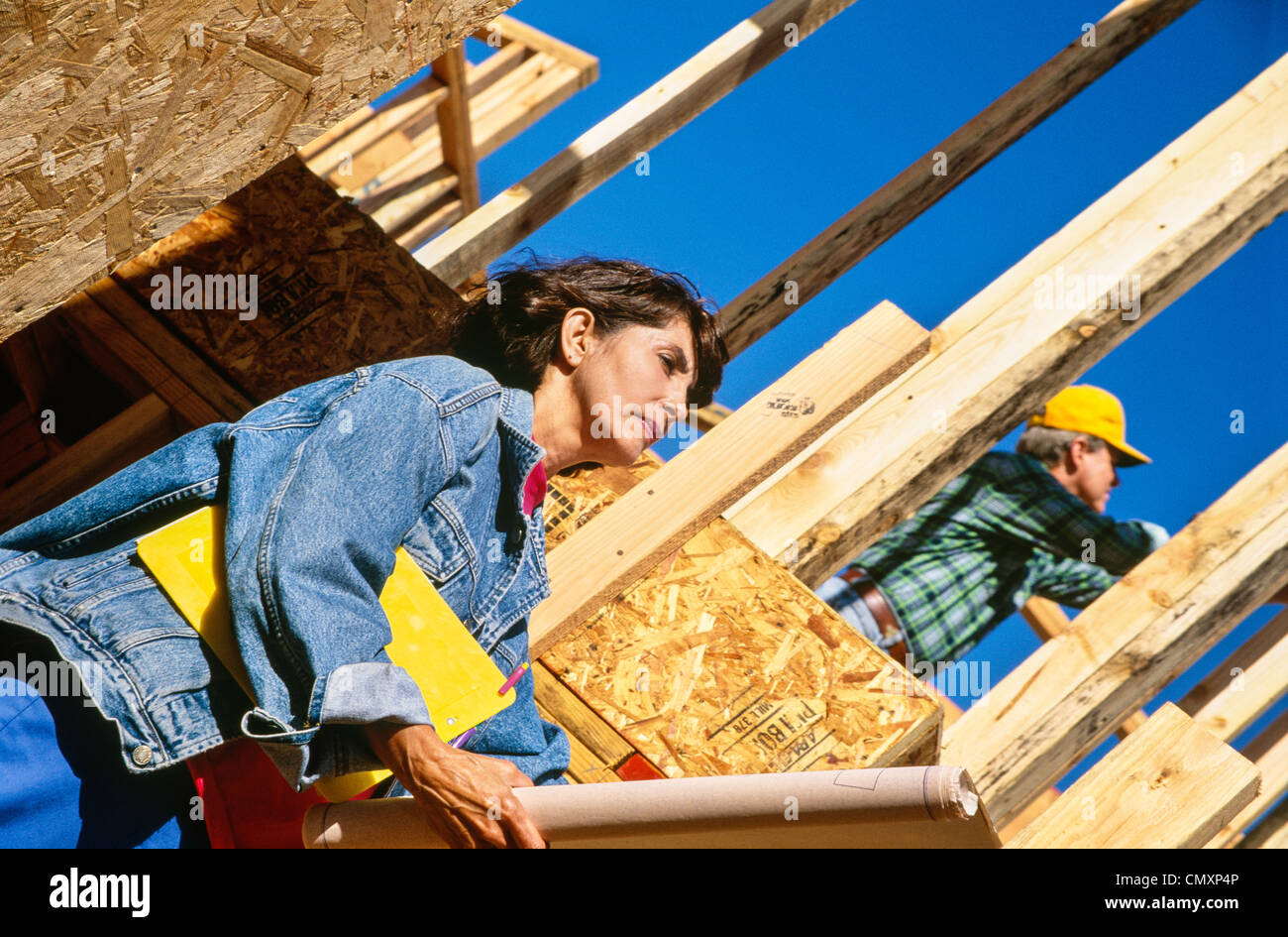 Female construction boss and male worker(, tradesman,) at site Stock ...