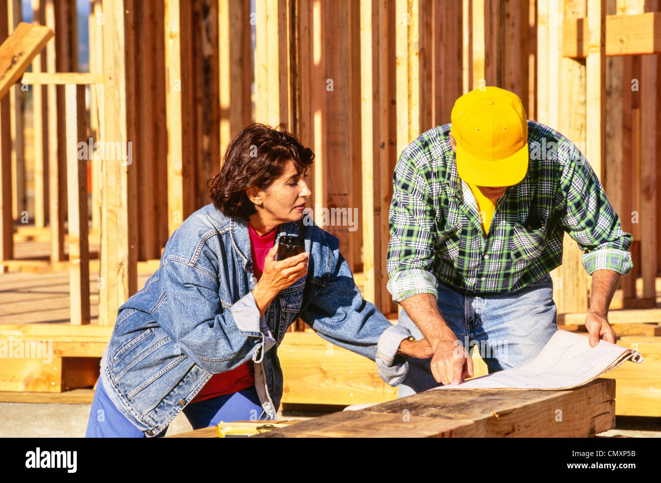 Female construction boss and male worker(, tradesman,) at site Stock ...