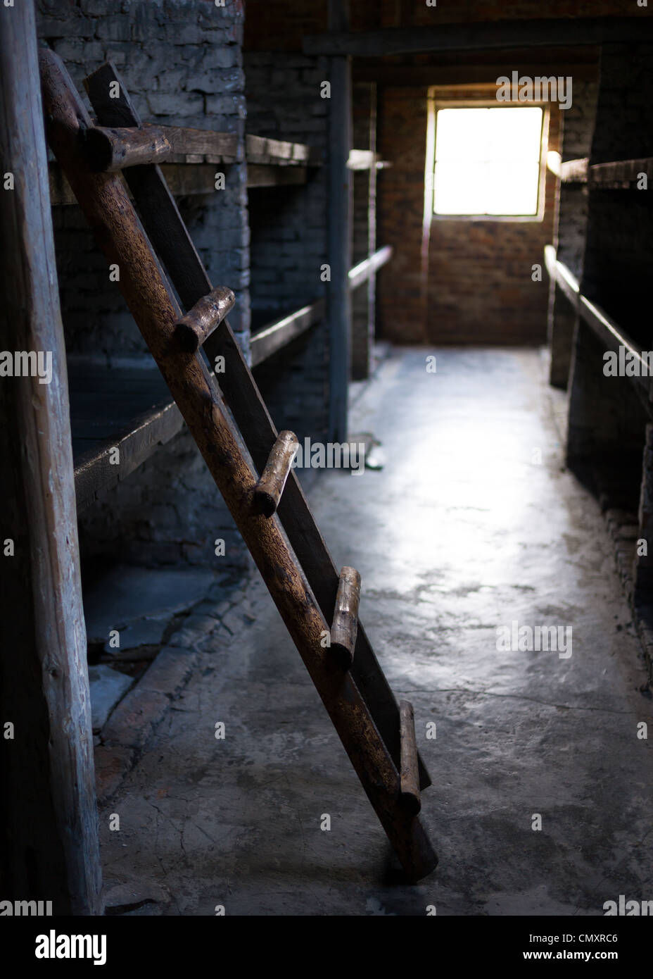 Bunk beds inside living quarters at the Auschwitz II, Birkenau ...