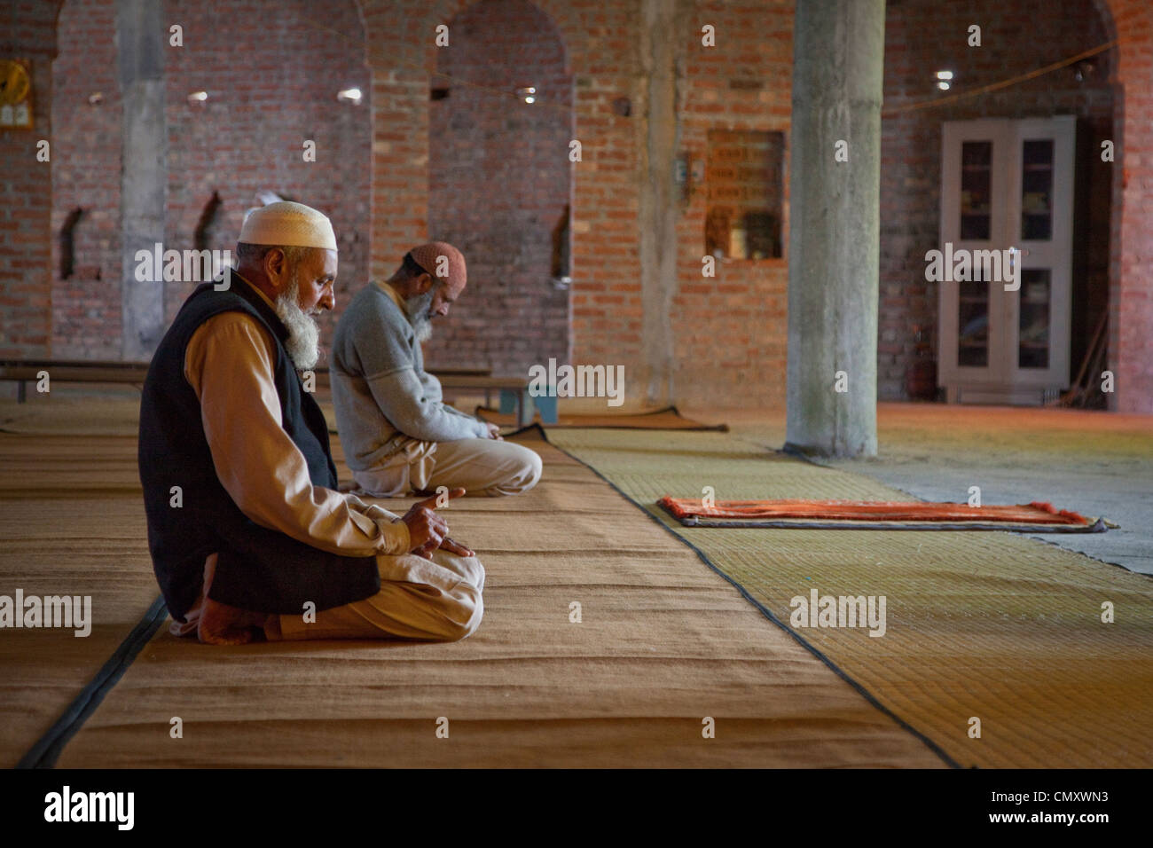 Worshipers Praying in Mosque under Construction, Madrasa Islamia Arabia ...