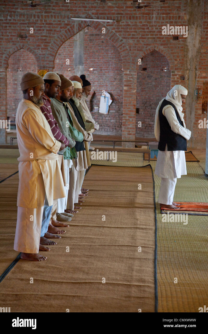 Worshipers Praying in Mosque under Construction, Madrasa Islamia Arabia ...