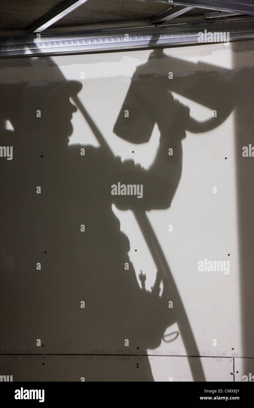 Construction worker shadow hi-res stock photography and images - Alamy