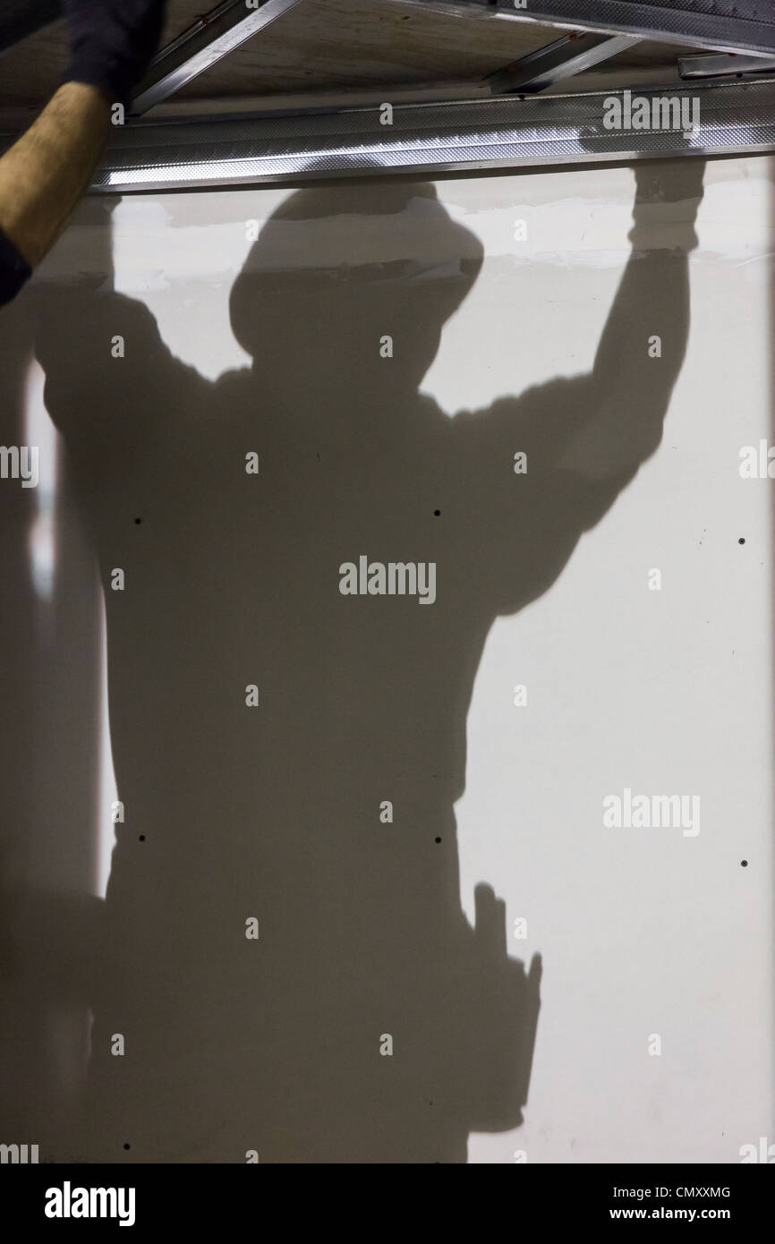 Labour worker silhouette hi-res stock photography and images - Alamy