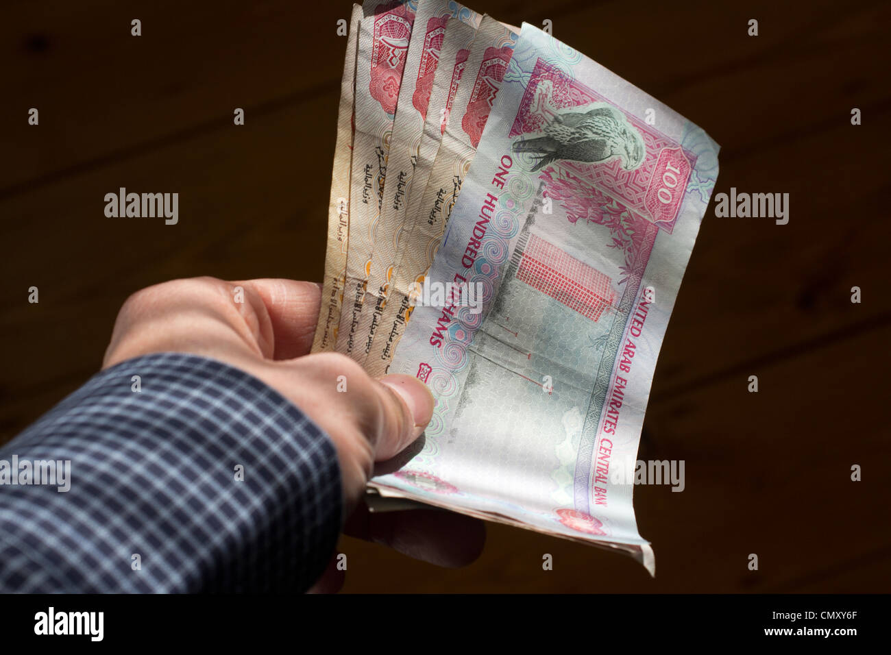 Uae dirhams hand hi-res stock photography and images - Alamy