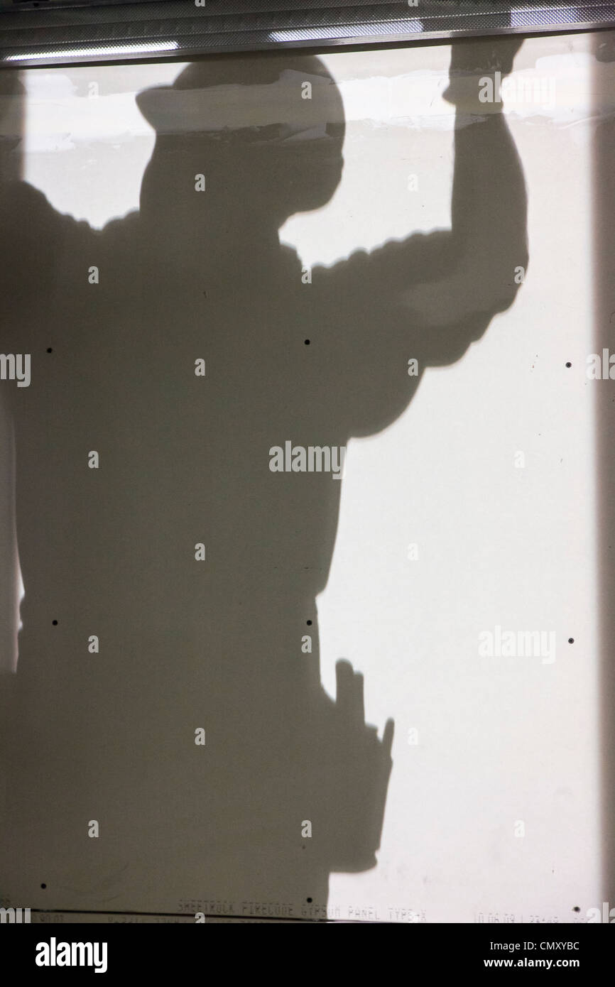 Shadow of construction worker hi-res stock photography and images - Alamy