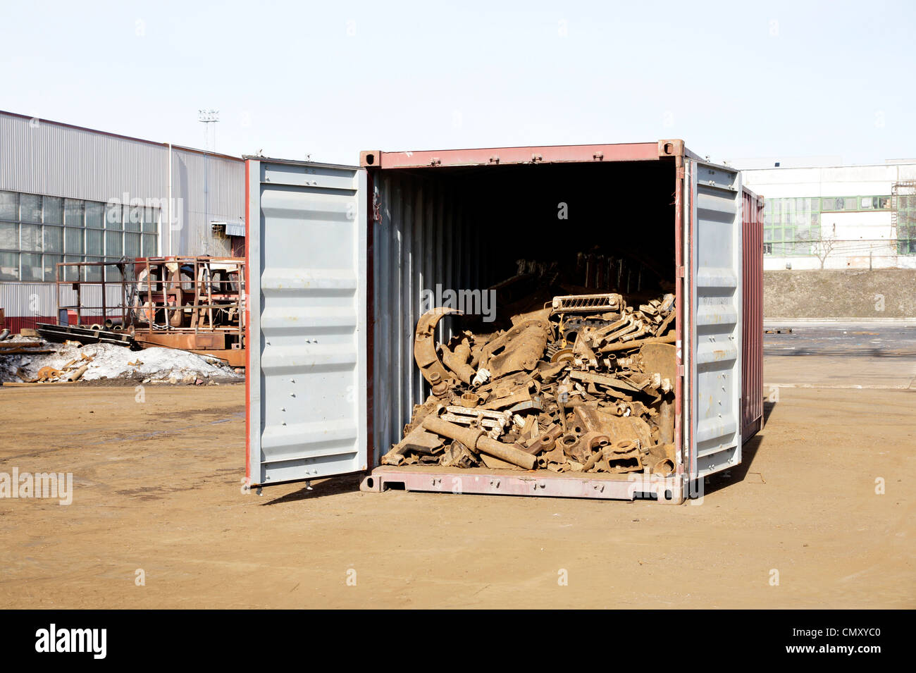 The scrap metal is in the open container Stock Photo - Alamy