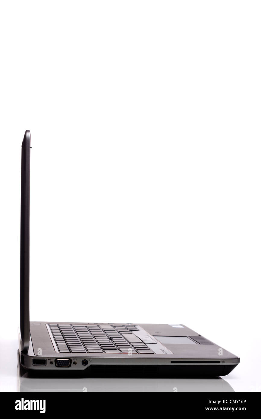 Side view of a laptop computer, with the screen in profile Stock Photo ...