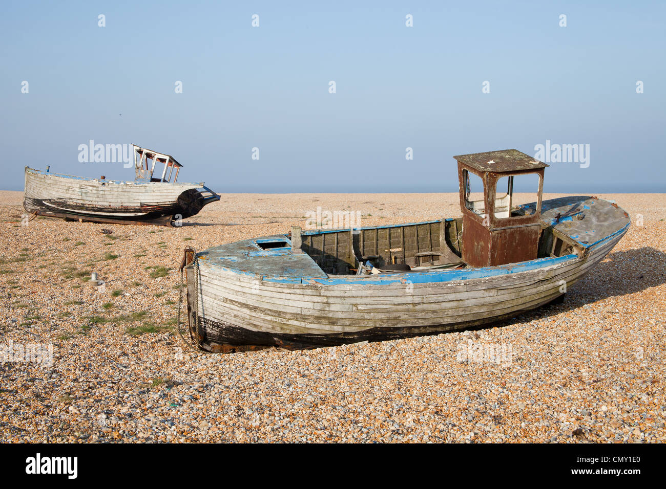 Two old fishing boats in bad condition after years of neglect on the ...