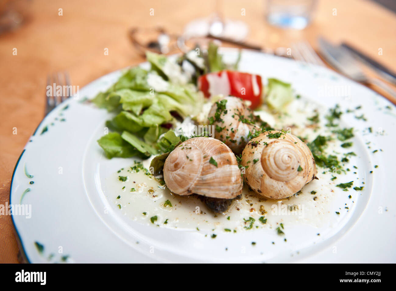 Cooked snail hi-res stock photography and images - Alamy