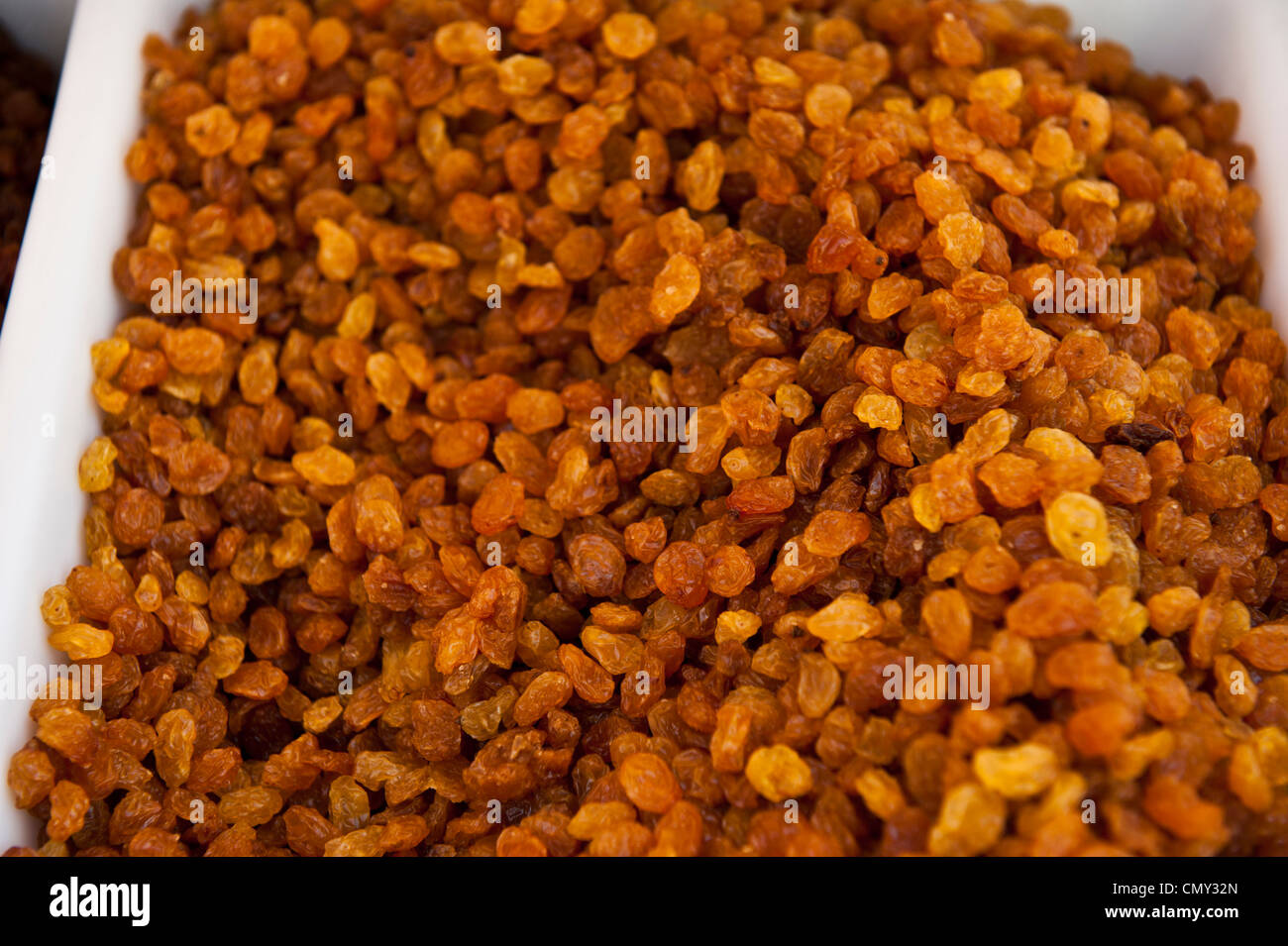 Brownish yellow raisins Stock Photo - Alamy