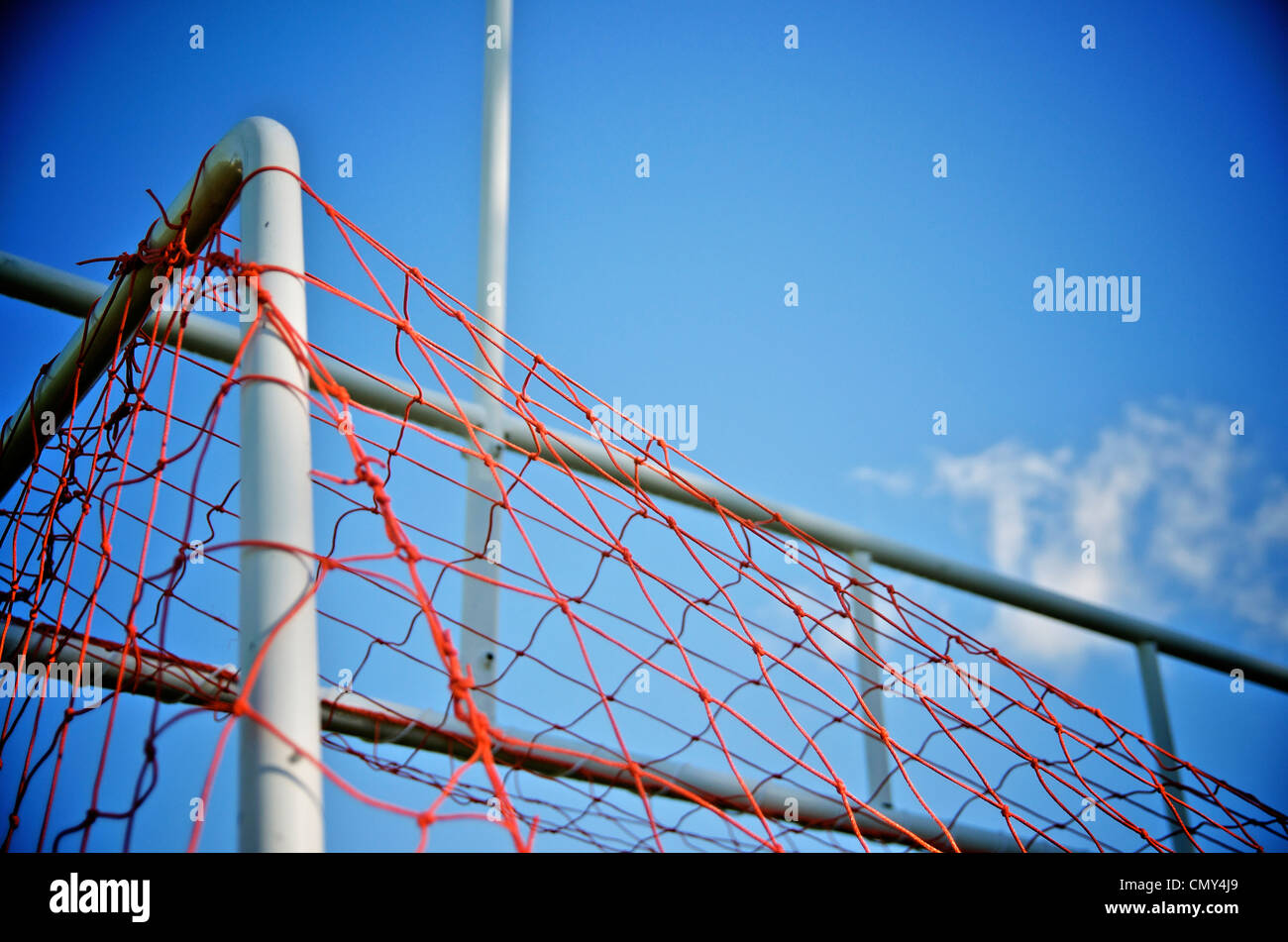 Bright orange goal net against blue sky, Otterburn park, Quebec Stock ...