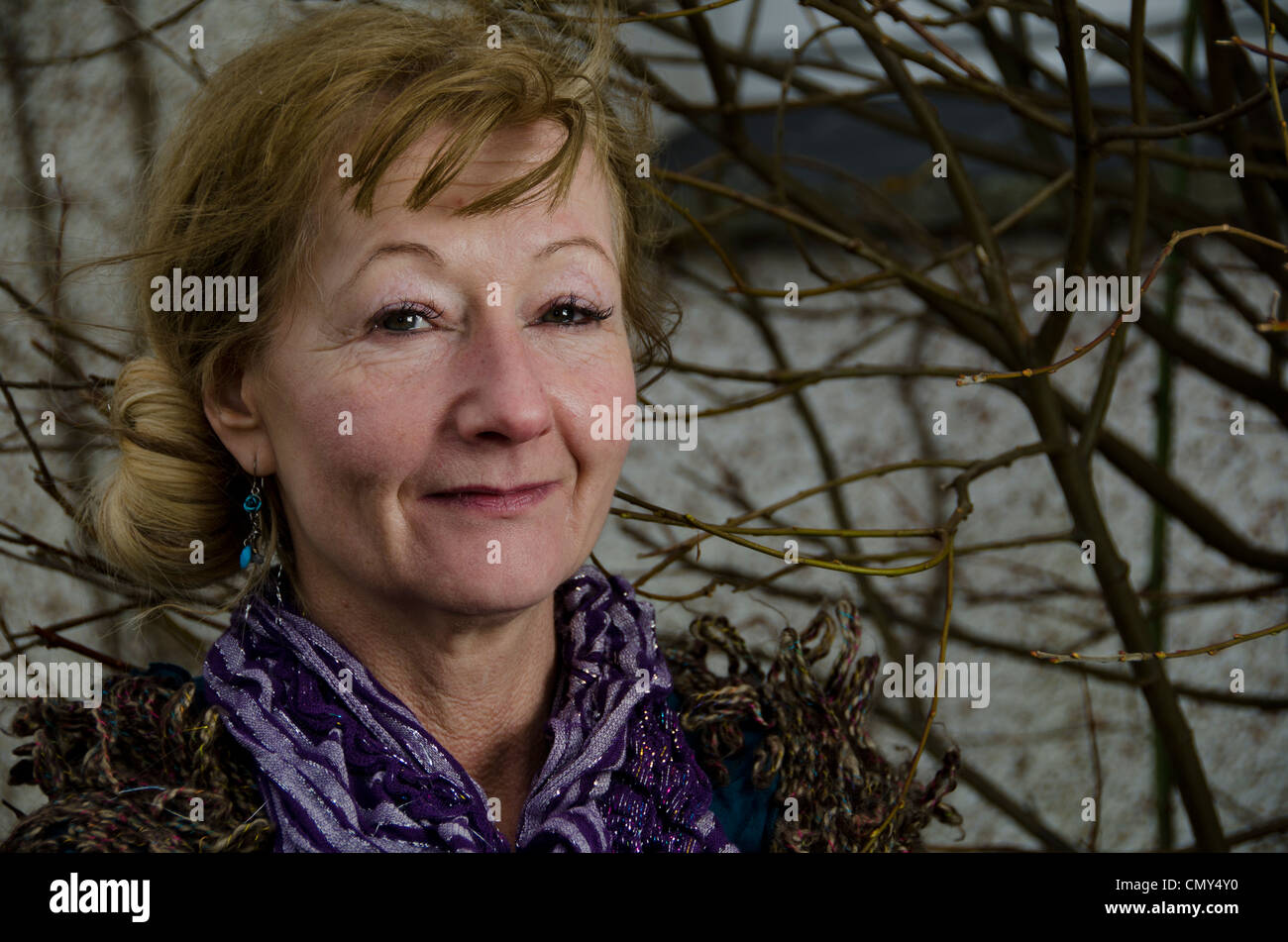 Portrait of a woman outside her house Stock Photo - Alamy