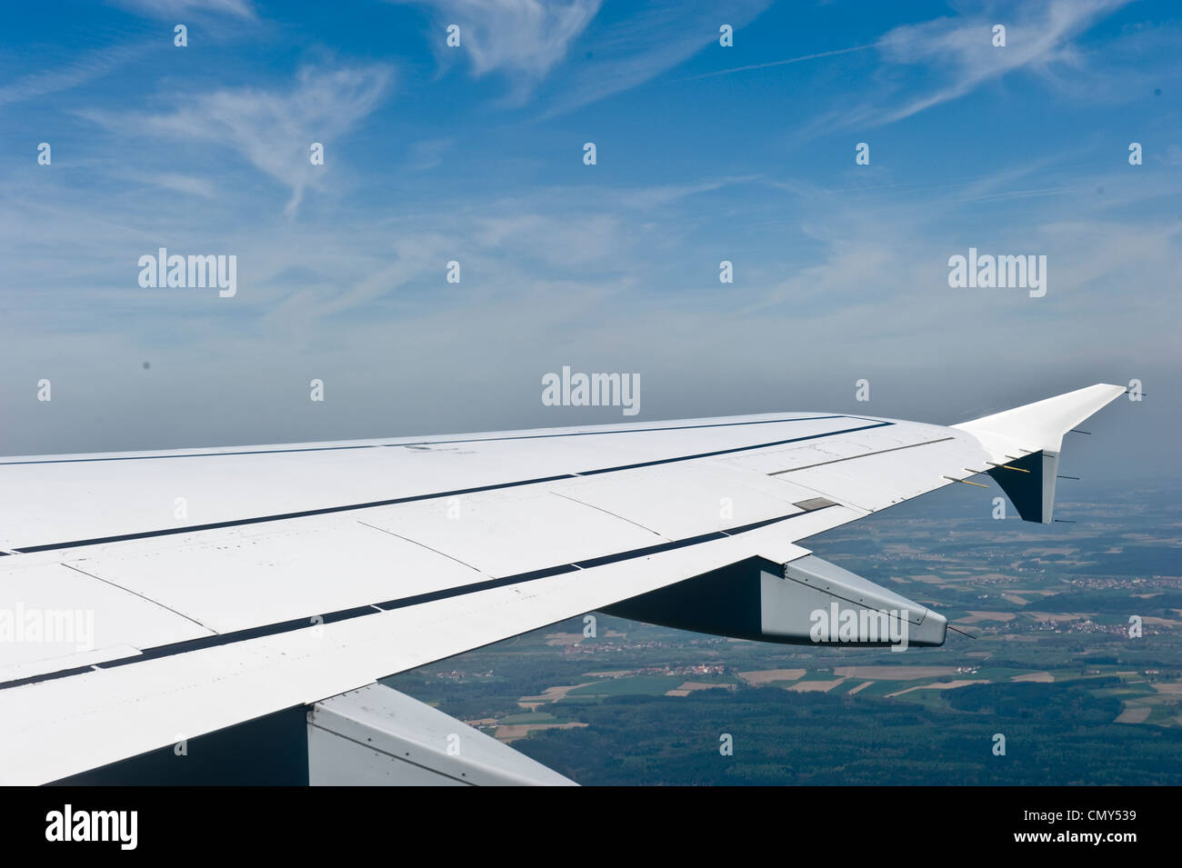 A view of the ground from a window of the wing of an airplane Stock ...