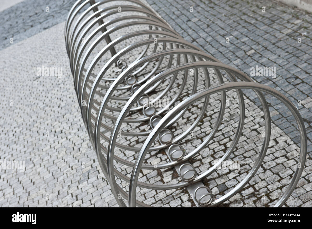 A side view of a brand new spiraling bike rack Stock Photo - Alamy