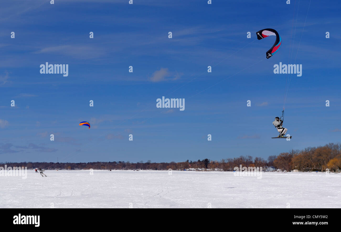 Skier airborne snow kiting on frozen Lake Simcoe Ontario Canada Stock ...