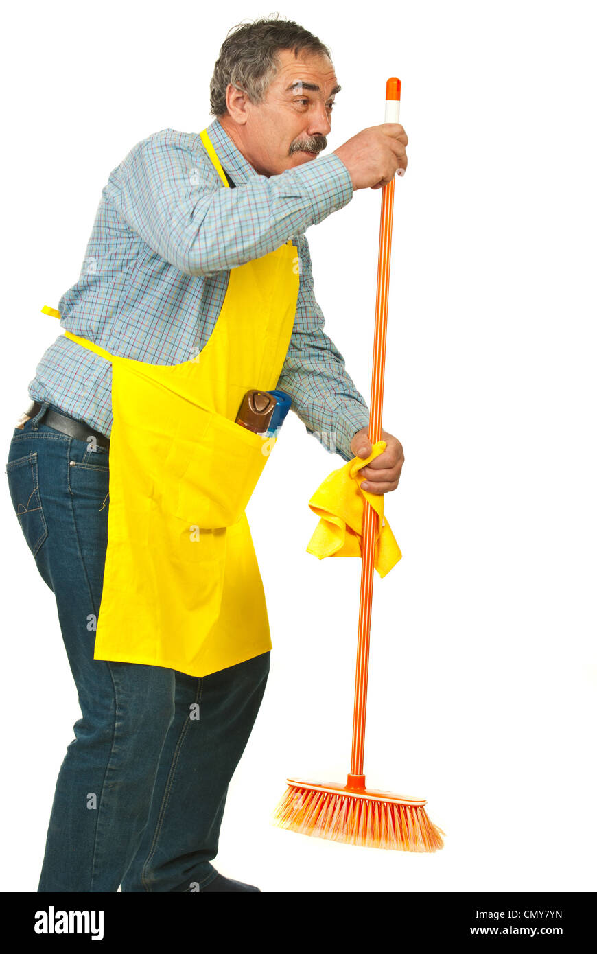 Senior cleaning man dancing with broom isolated on white background ...