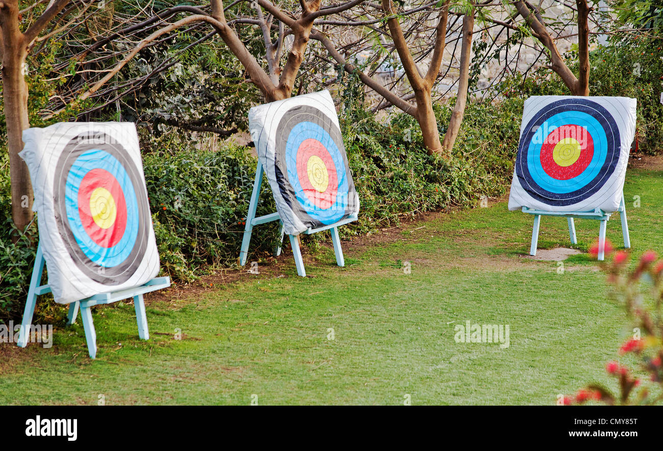 Lawns with hidden archery targets and range behind bushes Stock Photo ...