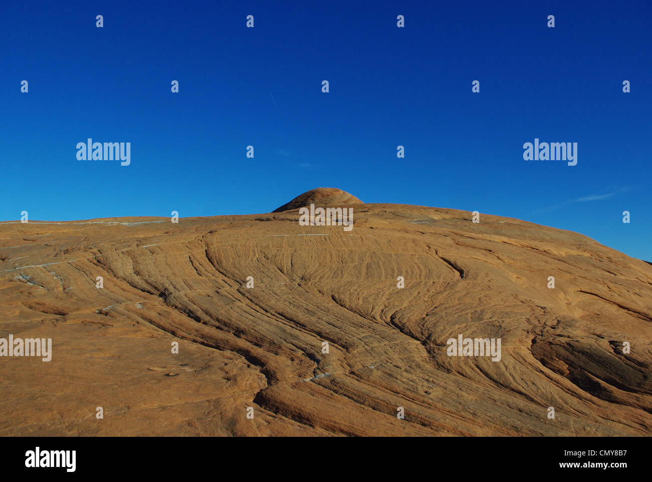 Layered rock under blue sky, Grand Stair Escalante National Monument ...