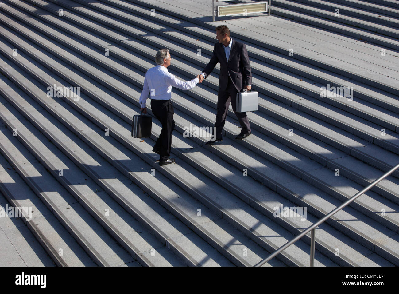 Germany, Bavaria, Munich, Business people shaking hands Stock Photo - Alamy