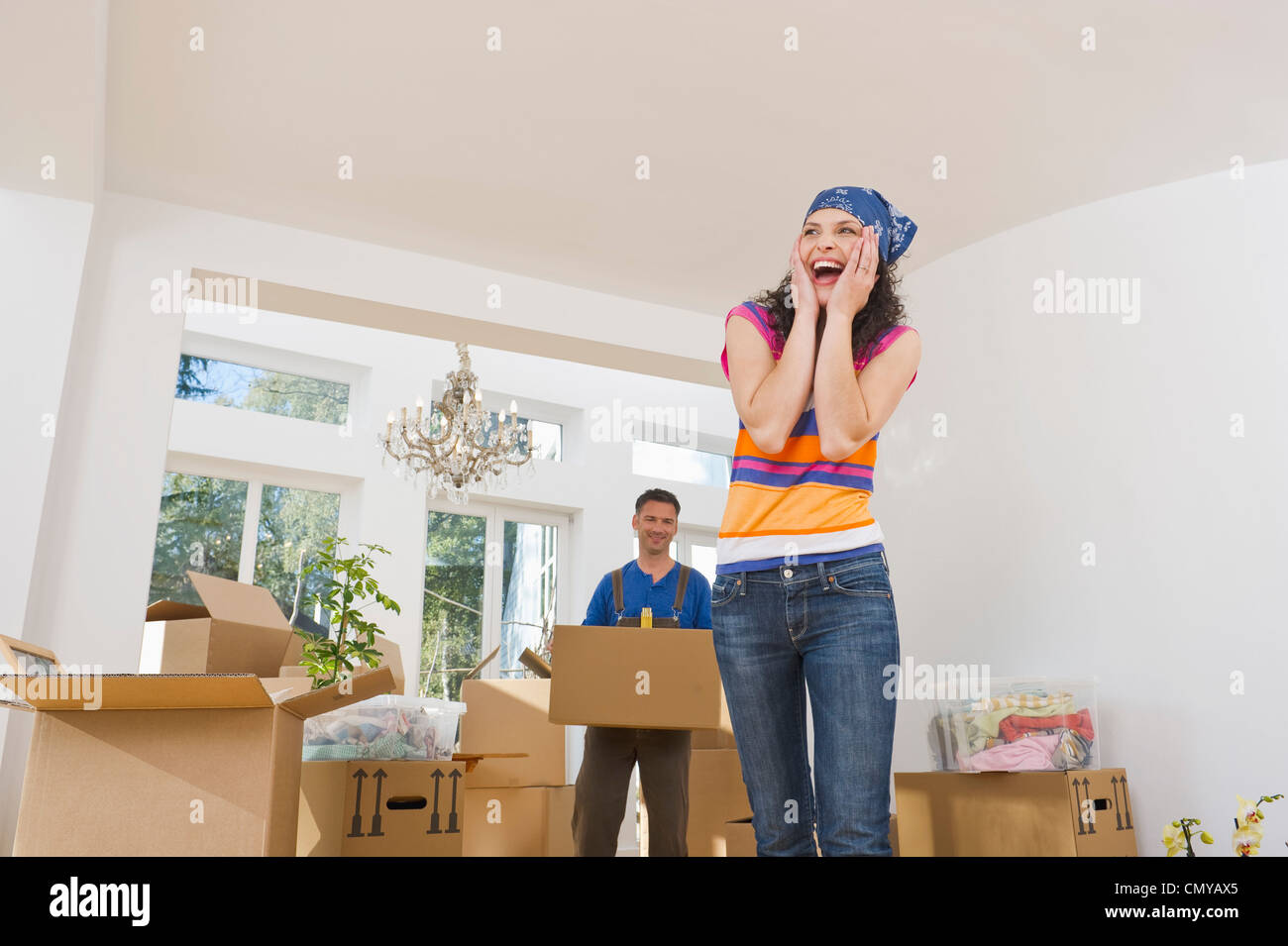 Germany, Bavaria, Grobenzell, Woman laughing with man in background ...