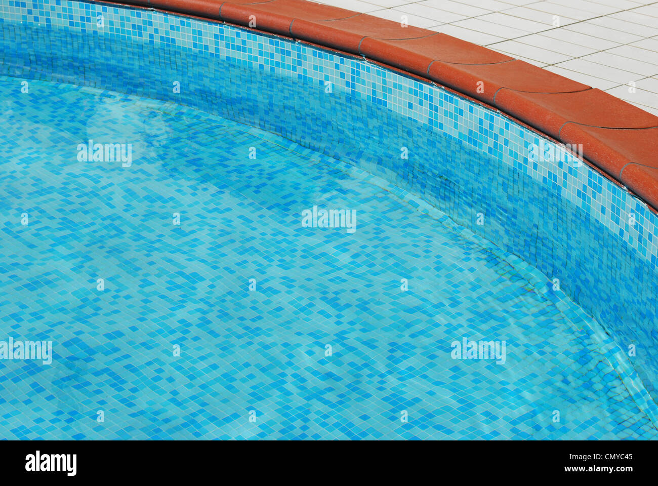 Clean water in a beautiful turquoise swimming pool detail as a ...