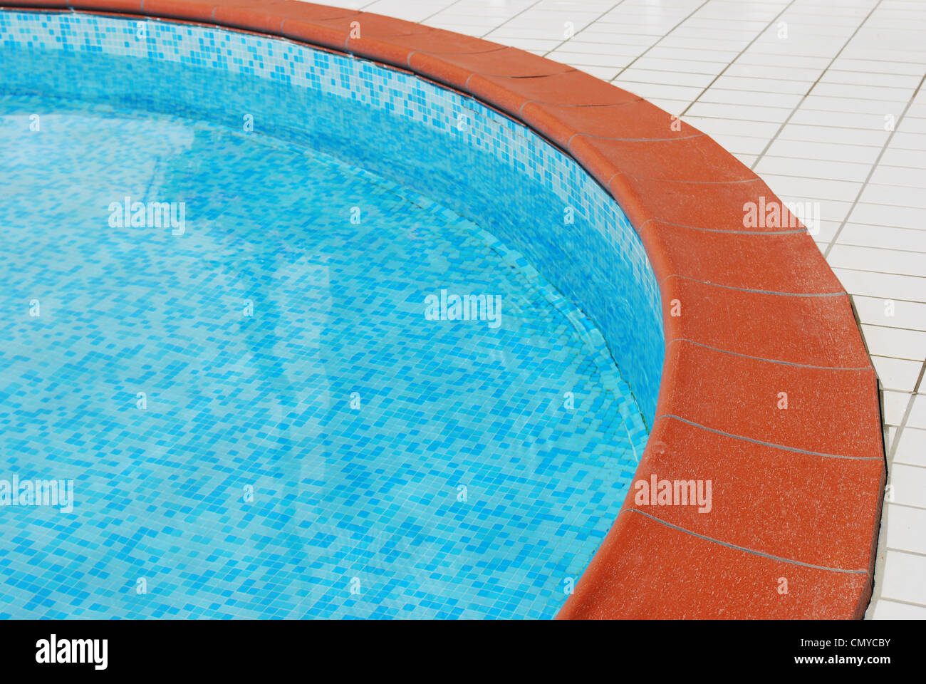 Clean water in a beautiful turquoise swimming pool detail as a ...