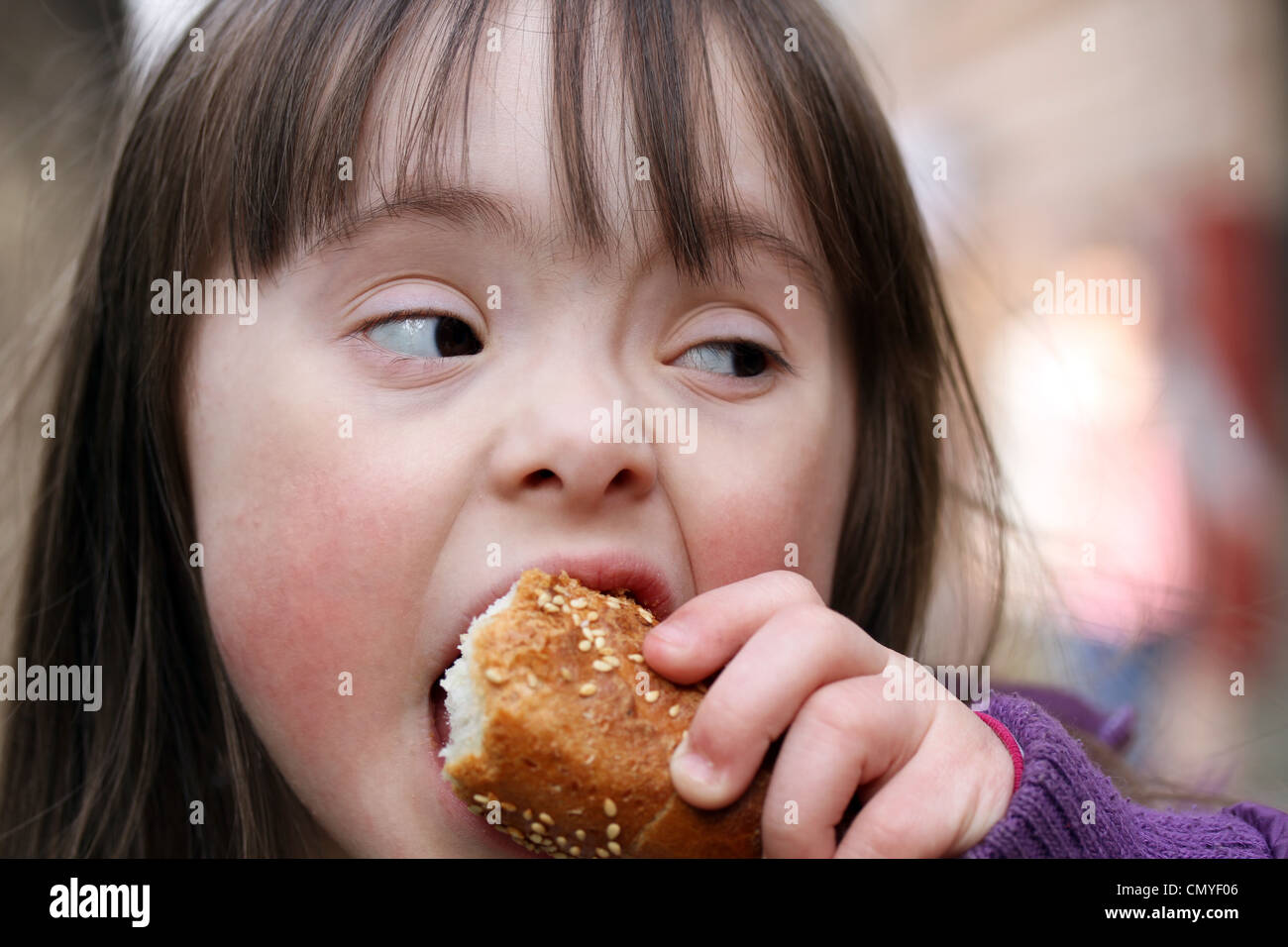 Portrait of beautiful girl that eating baguette Stock Photo - Alamy