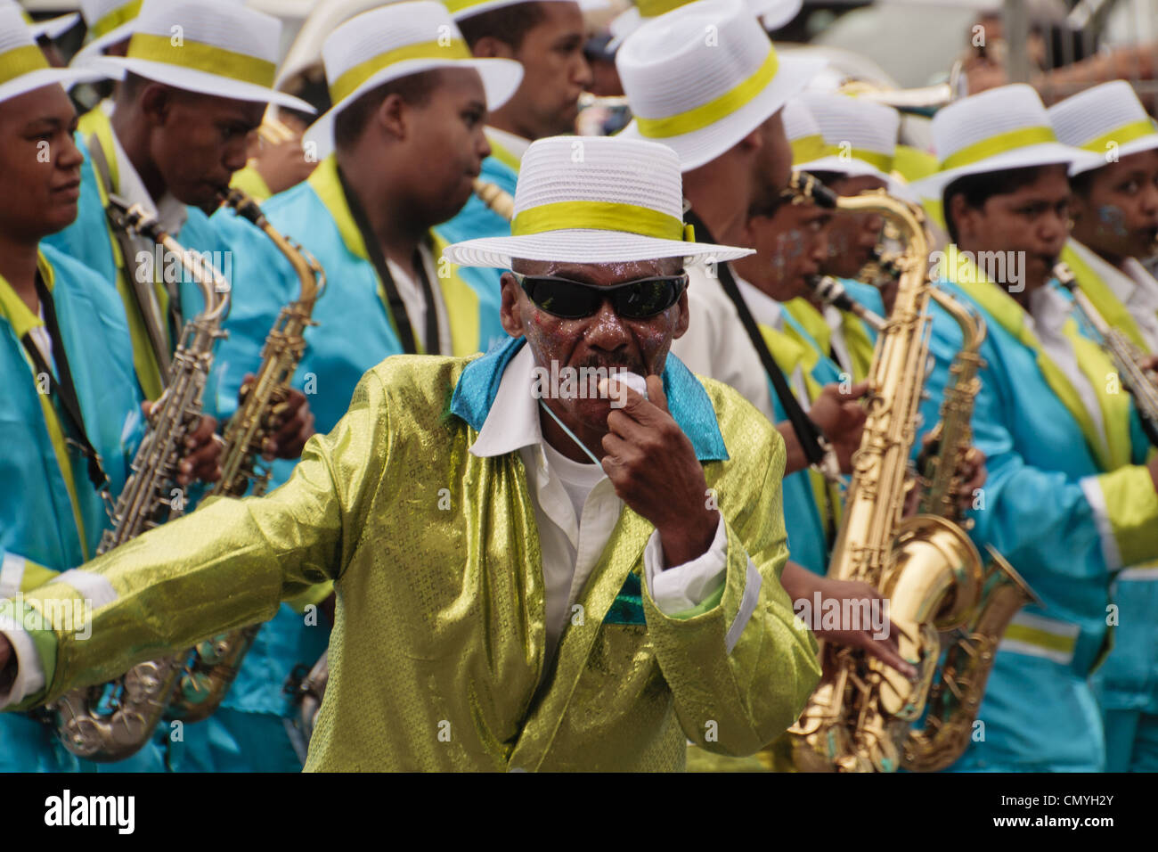 Old man blowing whistle at a carnival Stock Photo - Alamy