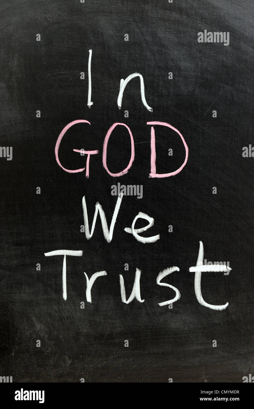 Conceptional chalk drawing - In god we trust Stock Photo - Alamy