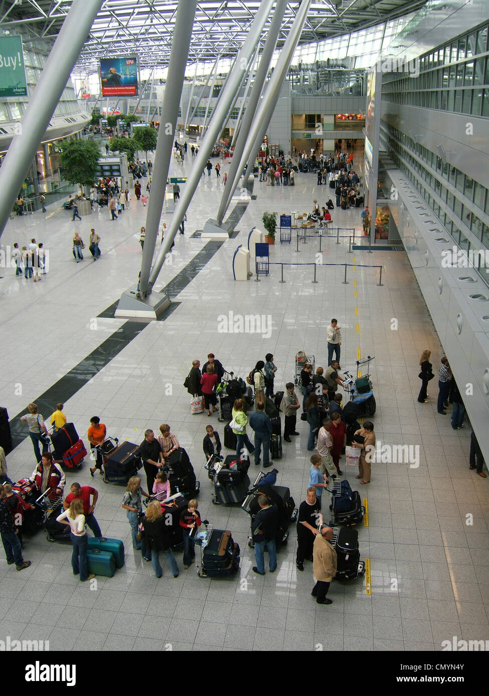 Duesseldorf, airport check in, crowd Stock Photo - Alamy