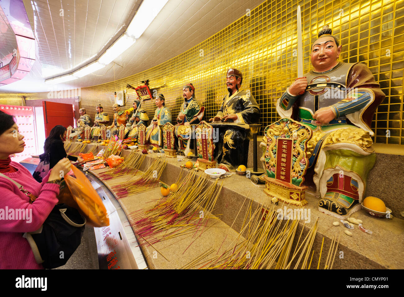 China, Hong Kong, Tsuen Wan, Yuen Yuen Institute, Worshippers Praying ...