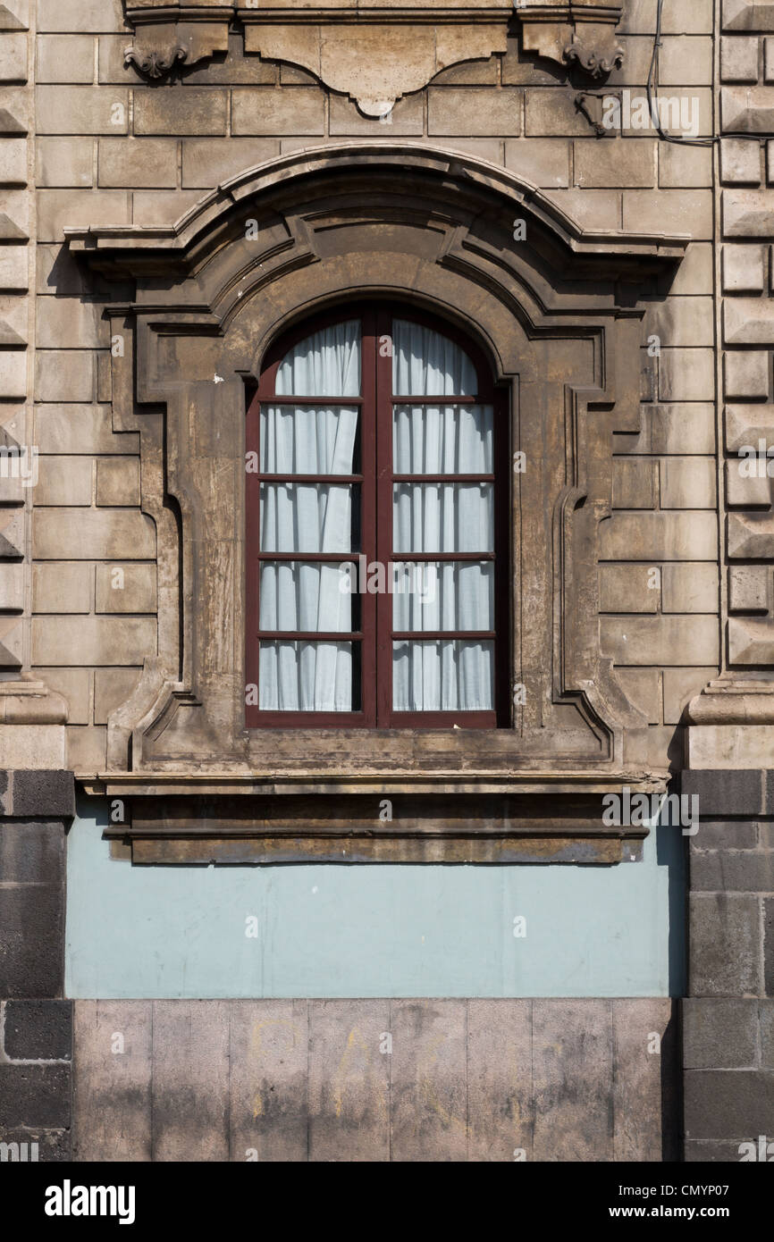 A baroque balcony and window from an ancient palace near the church in ...