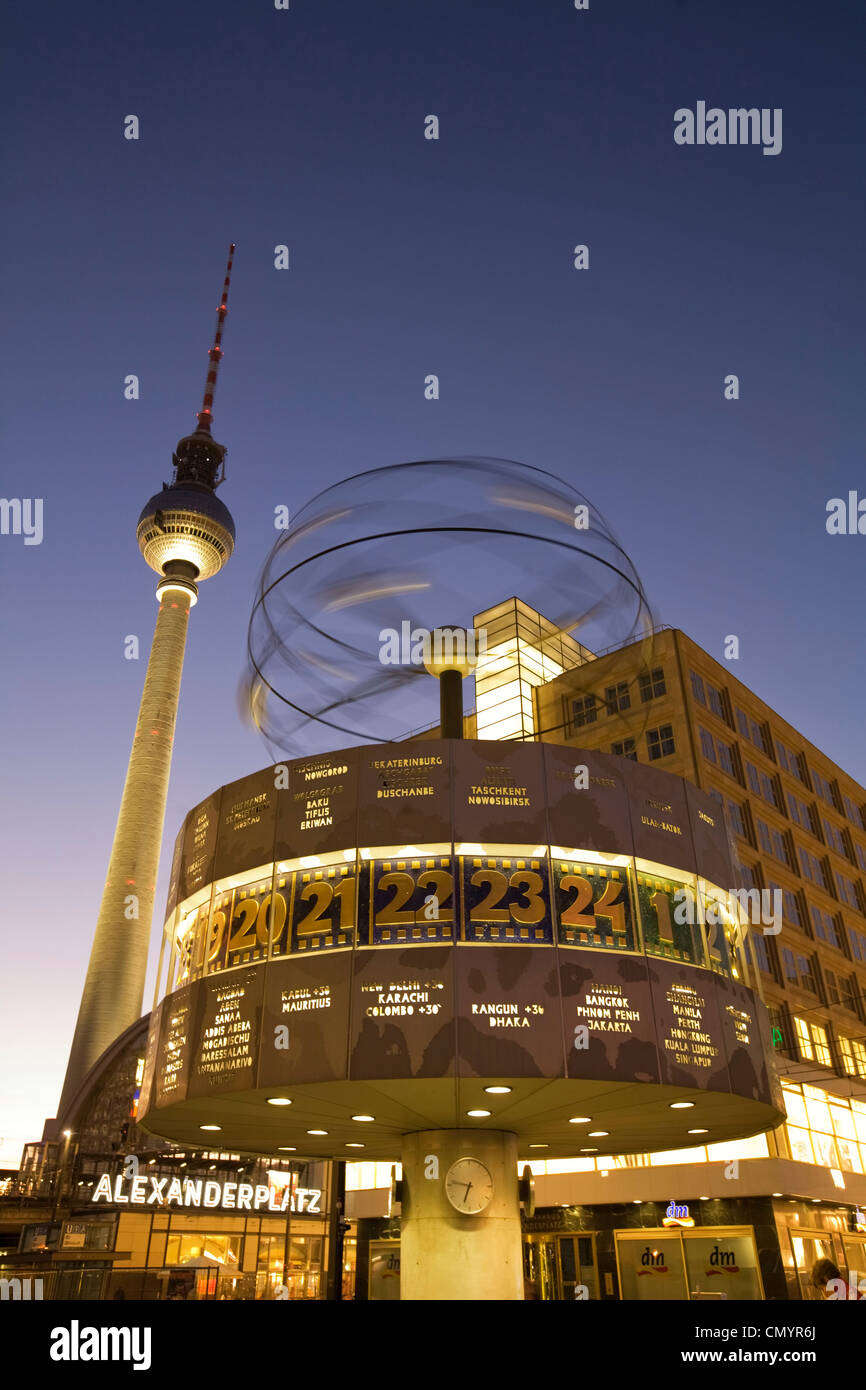 Alexanderplatz world clock TV tower at night in Berlin Stock Photo - Alamy