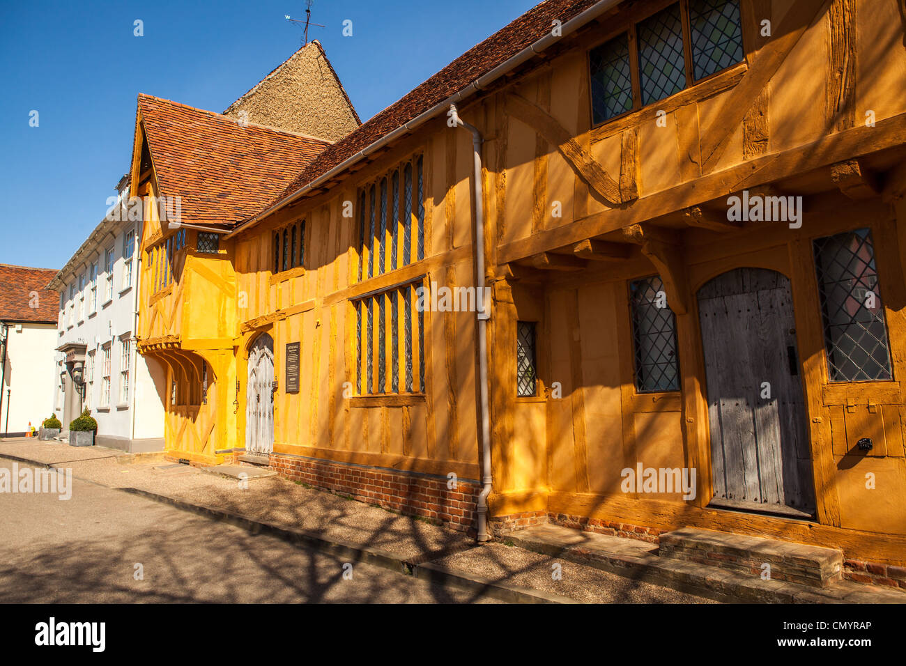 Little Hall, a mustard yellow coloured medieval Tudor building in ...
