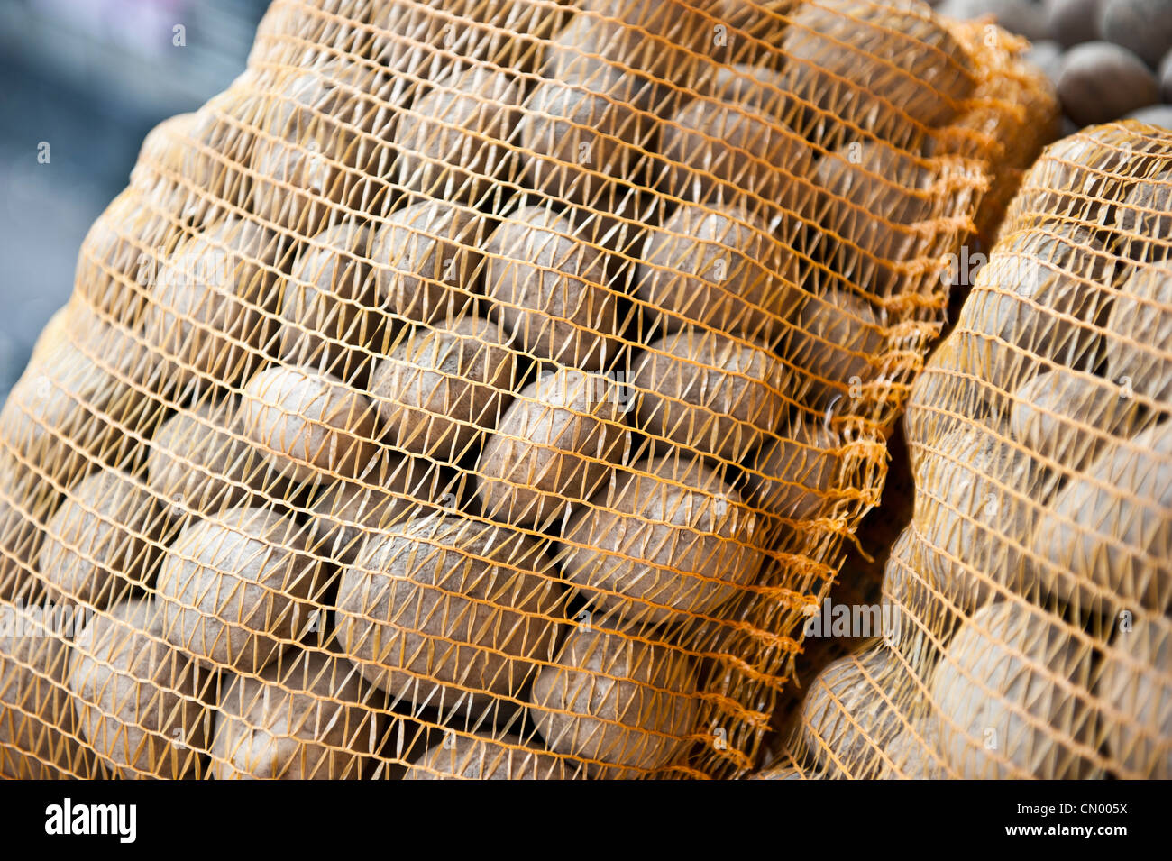 Raw potatoes in net hi-res stock photography and images - Alamy