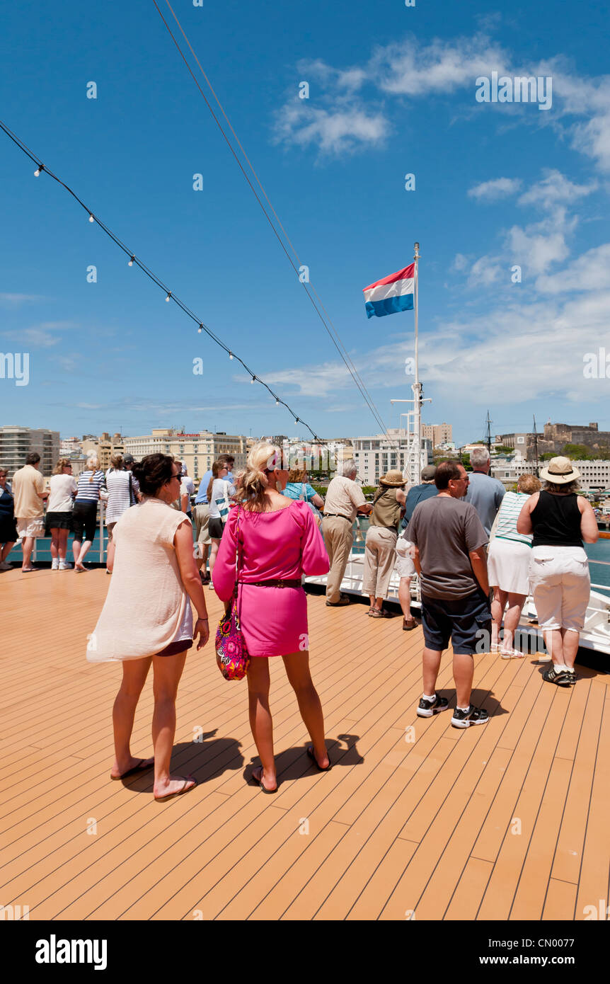 The deck of the cruise ship with passengers while approaching port in San Juan, Puerto Rico on a ...