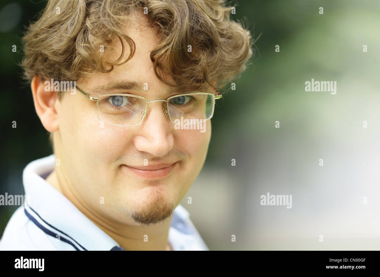 Young blond handsome man glasses hi-res stock photography and images ...