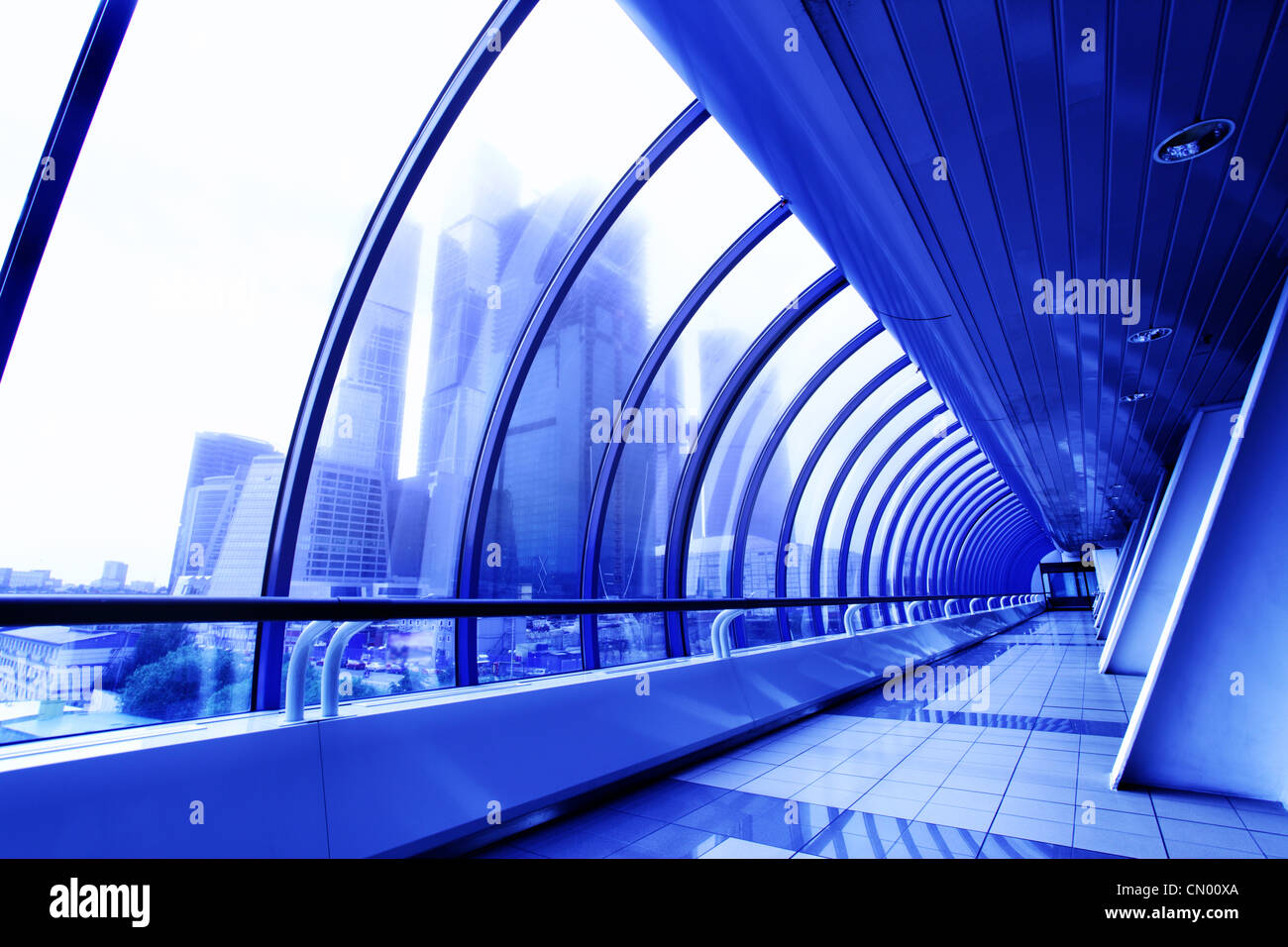 Perspective of the covered bridge and skyscrapers beyond window Stock ...