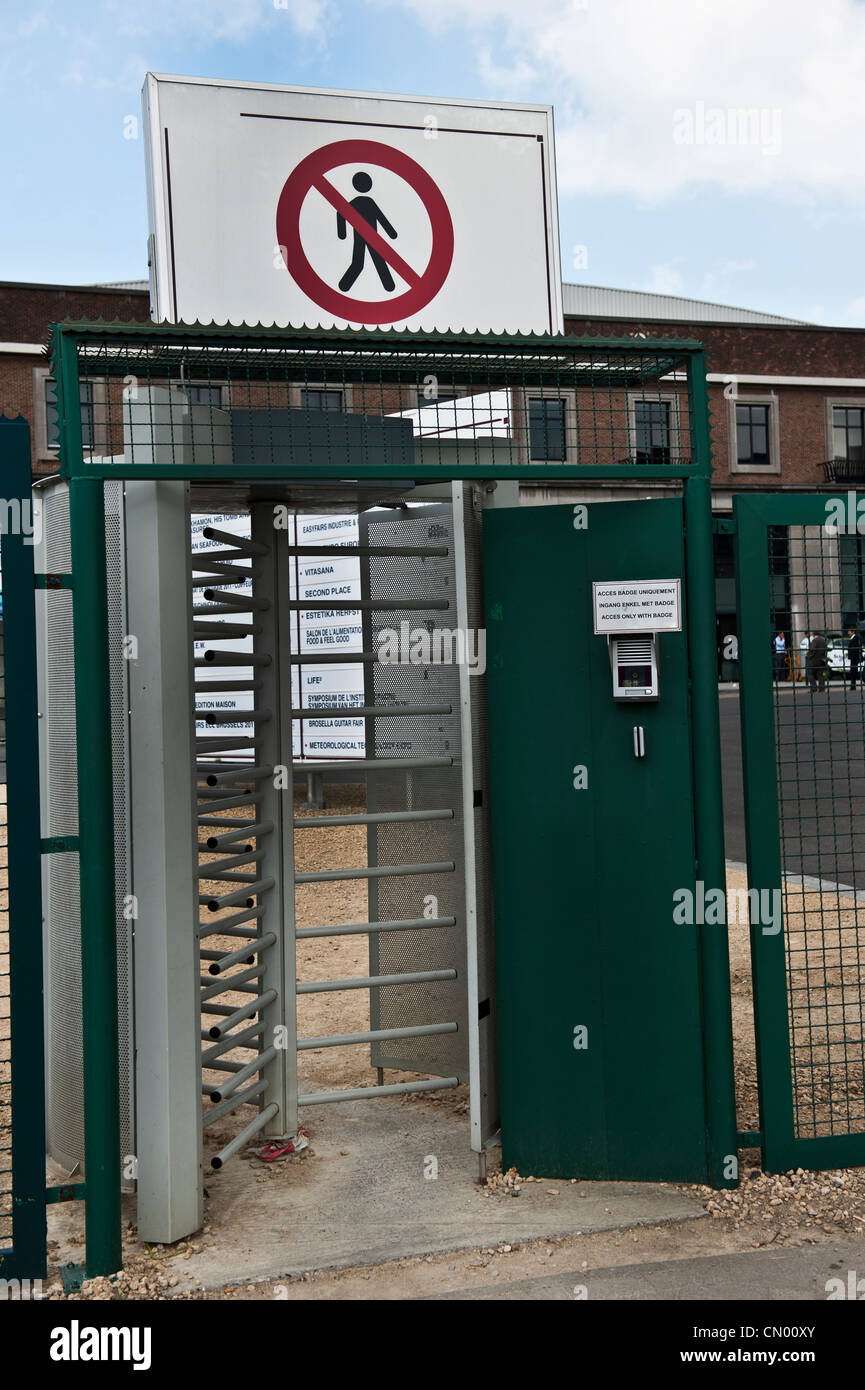 A "No Tresspassing" sign above forest green gates in Belgium Stock ...