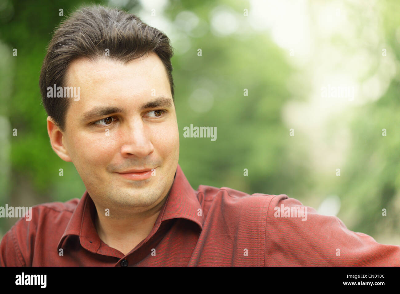 Portrait of the handsome young man close-up Stock Photo - Alamy