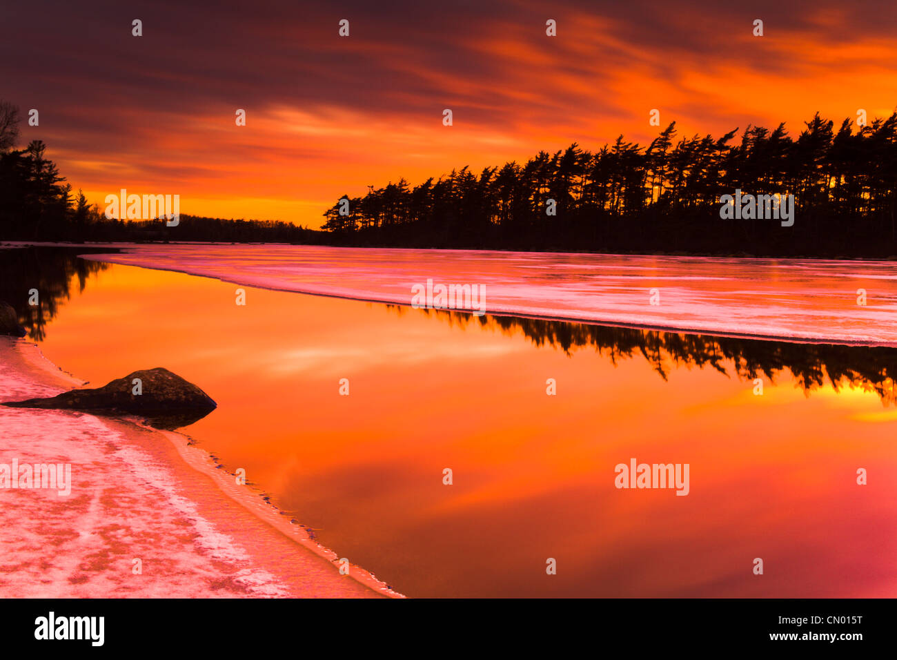 Spring Thaw Sunset, Rocky Lake, Nova Scotia Stock Photo - Alamy