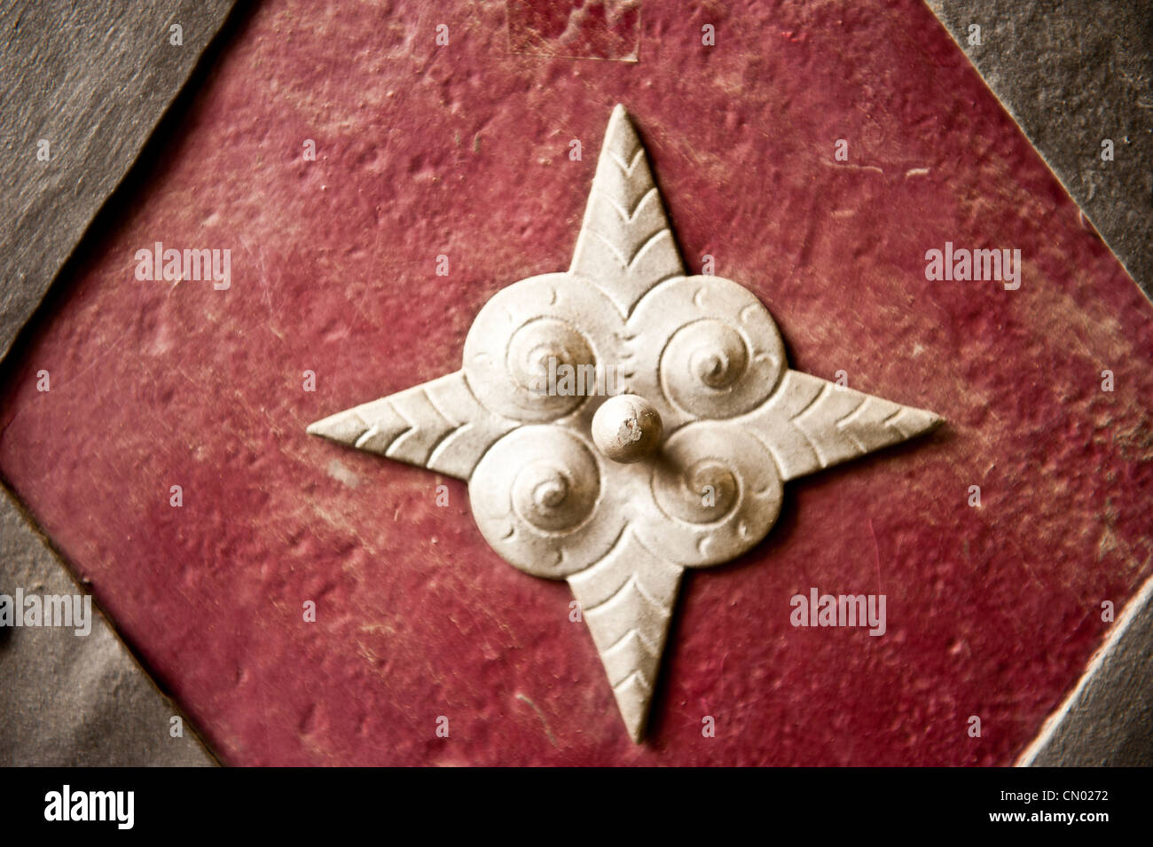 Closeup of an artistic star-shaped emblem Stock Photo - Alamy