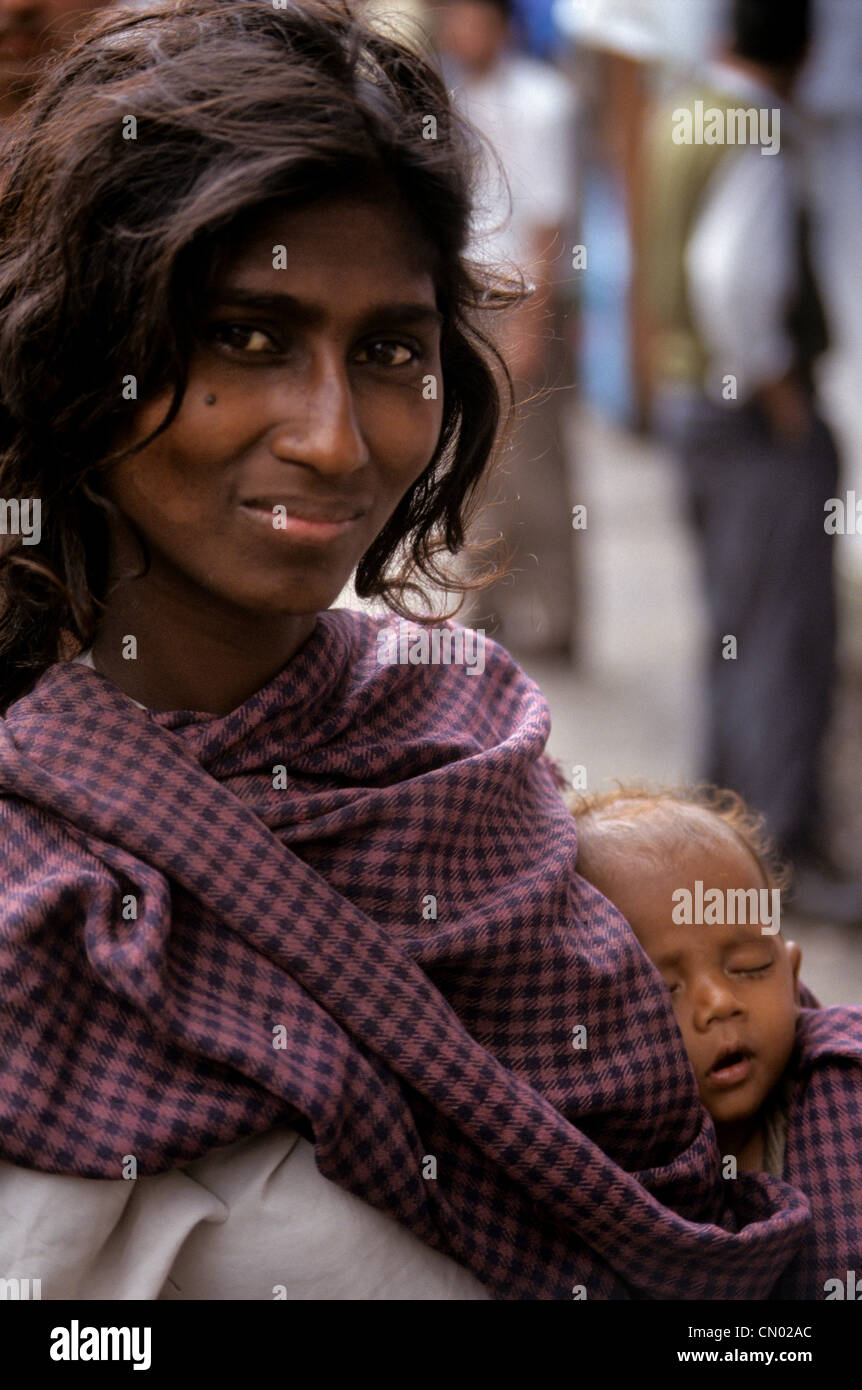 Local woman with a baby in India Stock Photo - Alamy