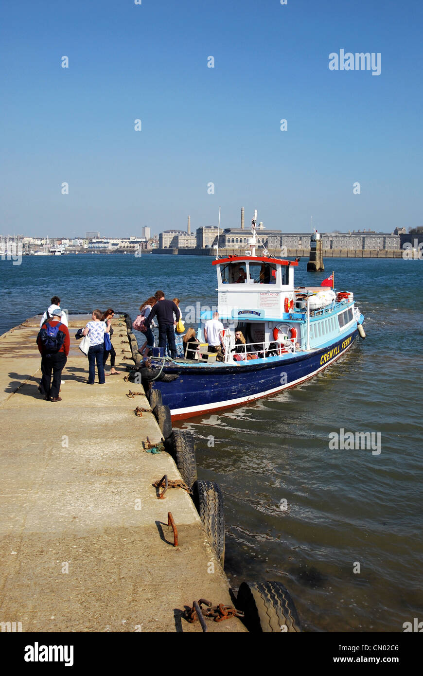 The Cremyll Ferry loads passengers at Cremyll in Cornwall for a ...