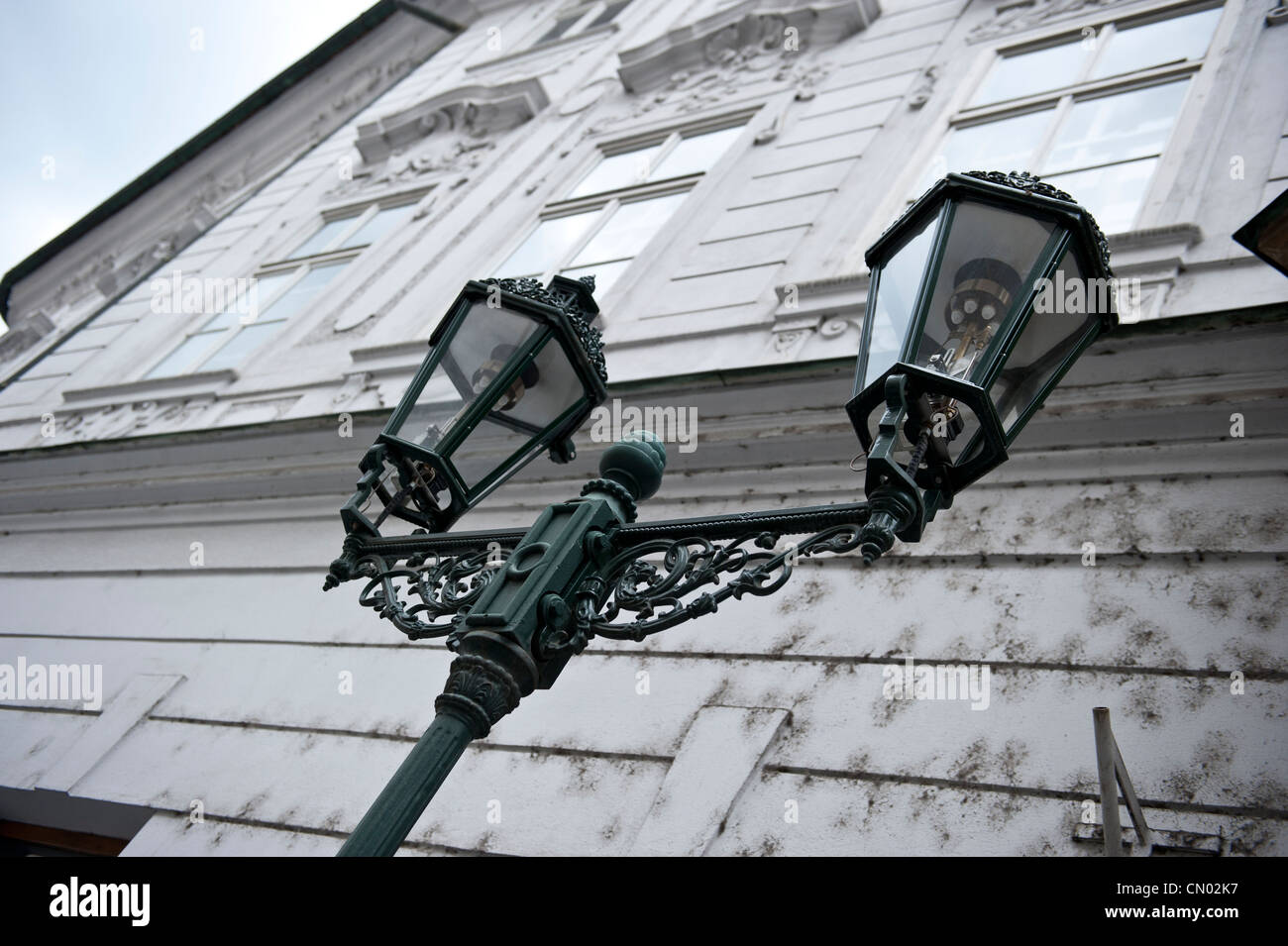 A low angle color shot of unlit sidewalk lamps Stock Photo - Alamy