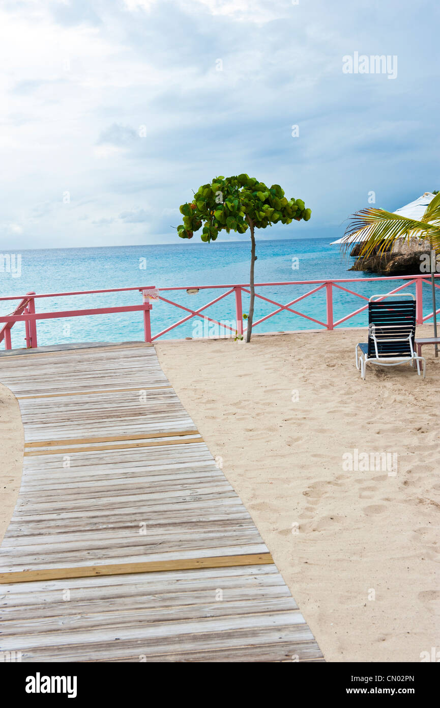 A peaceful walking path on a beach Stock Photo - Alamy