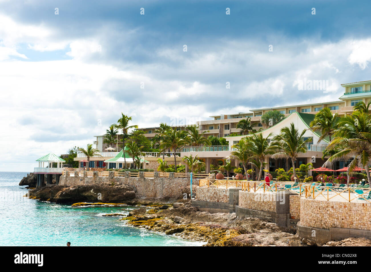 A coastline surrounding a beach resort Stock Photo - Alamy