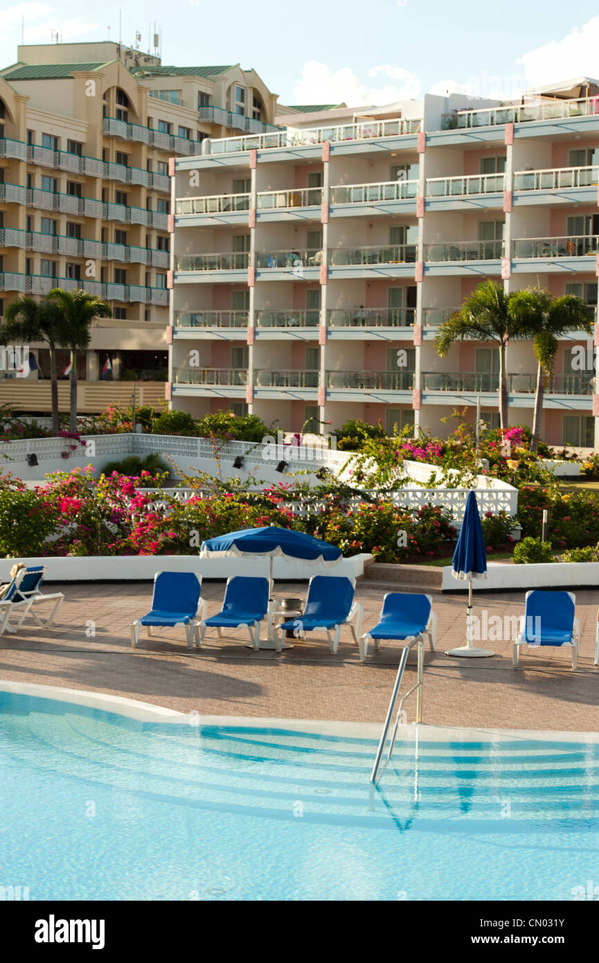 The poolside area with the resort in the background Stock Photo - Alamy